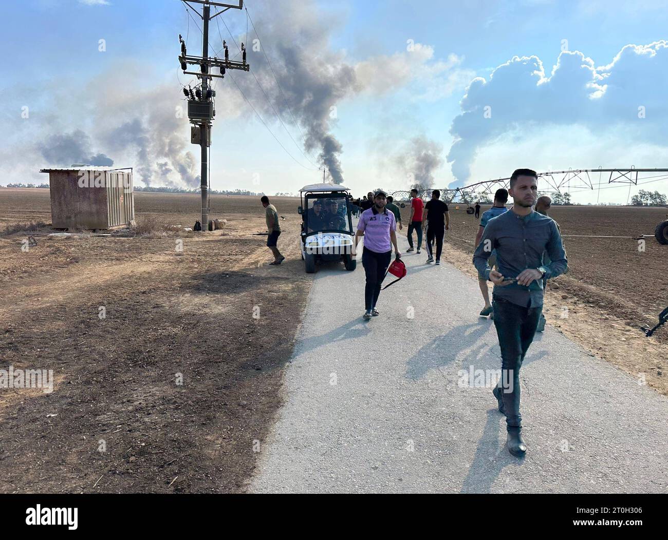 Palestine. 07th Oct, 2023. Palestinians crossing the border fence with ...