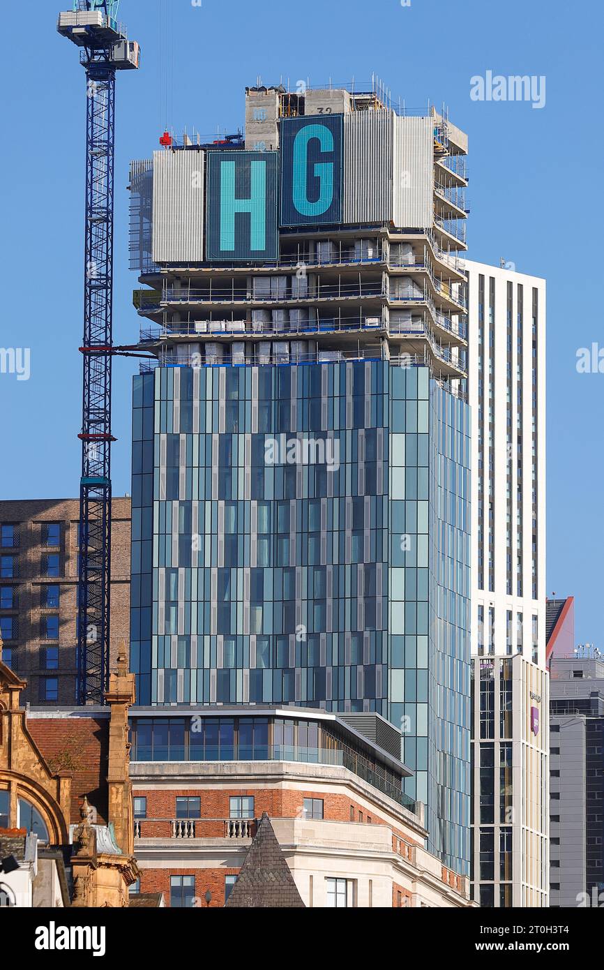 A tower crane in front of the new building under construction on 44 ...