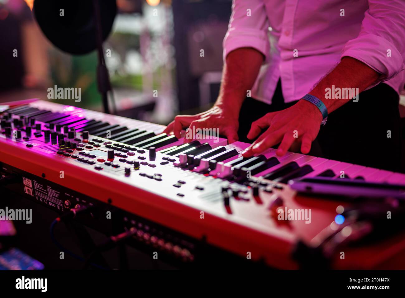 Musician playing electronic musical keyboard synthesizer Stock Photo ...