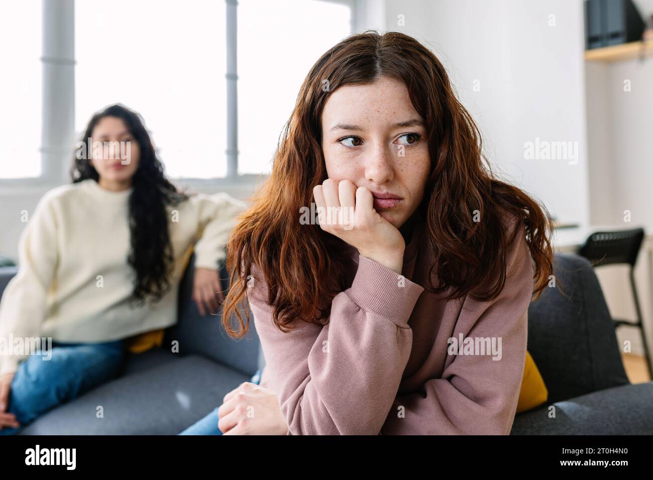 Two angry friends sitting hi-res stock photography and images - Alamy