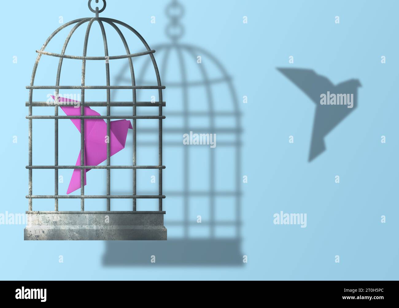 Freedom. Caged origami bird and it's released shadow on light blue background Stock Photo - Alamy