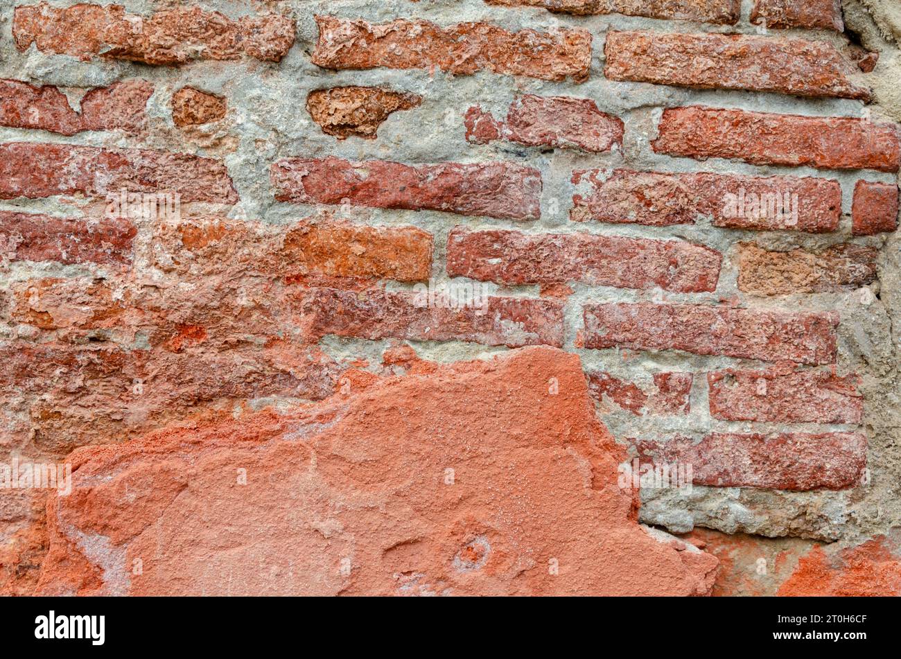 Grunge brick wall of an ancient Venetian building for your background ...