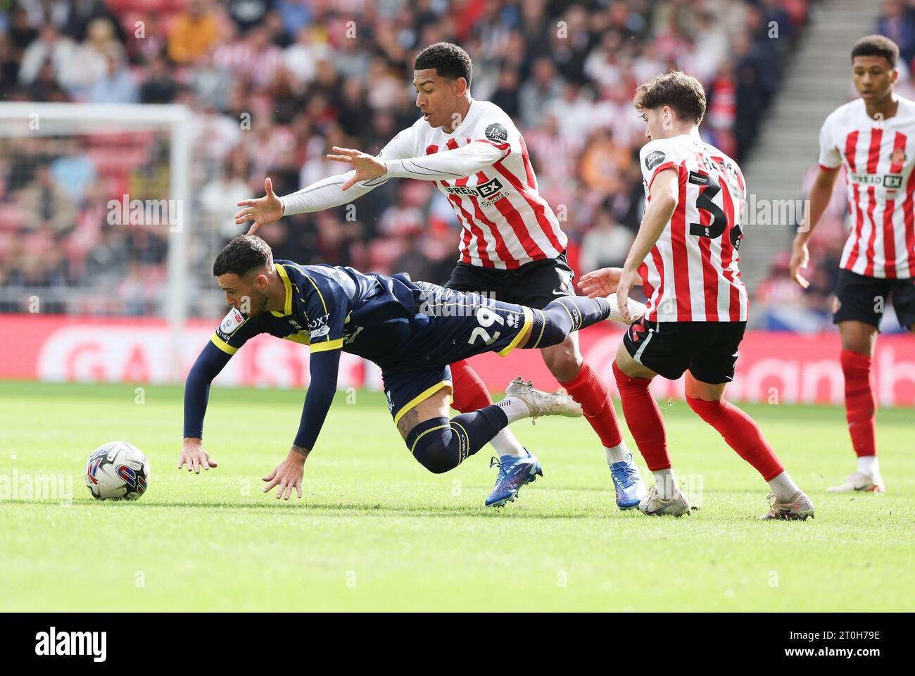 Sam Greenwood of Middlesbrough in action with Thai Hume and Jobe of ...