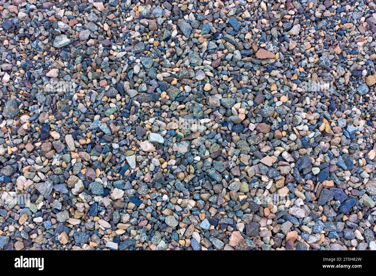 Stone background gravel. Granite texture. The rocky road. Fine pebbles ...