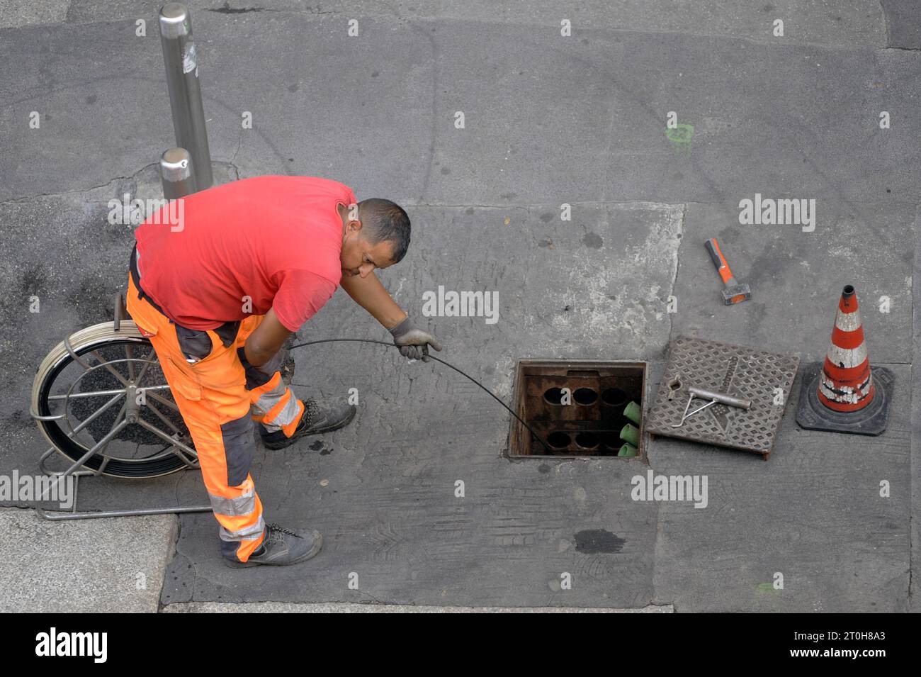Milan (Italy), optical fiber cable laying Stock Photo - Alamy