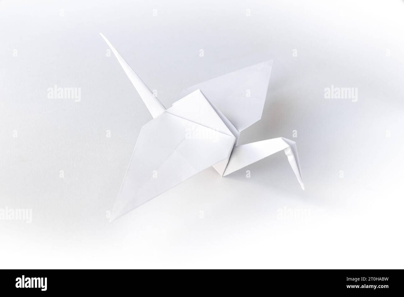 Paper crane origami isolated on a blank white background Stock Photo ...