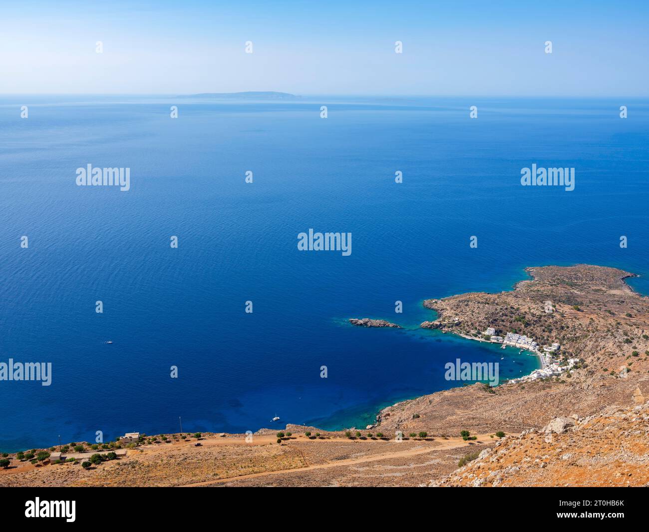 View over the sea, in the back the island of Kastri, below coast with ...