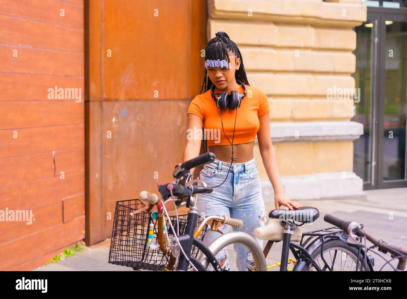 Lifestyle with a young trap dancer in the city. Black girl of African ...