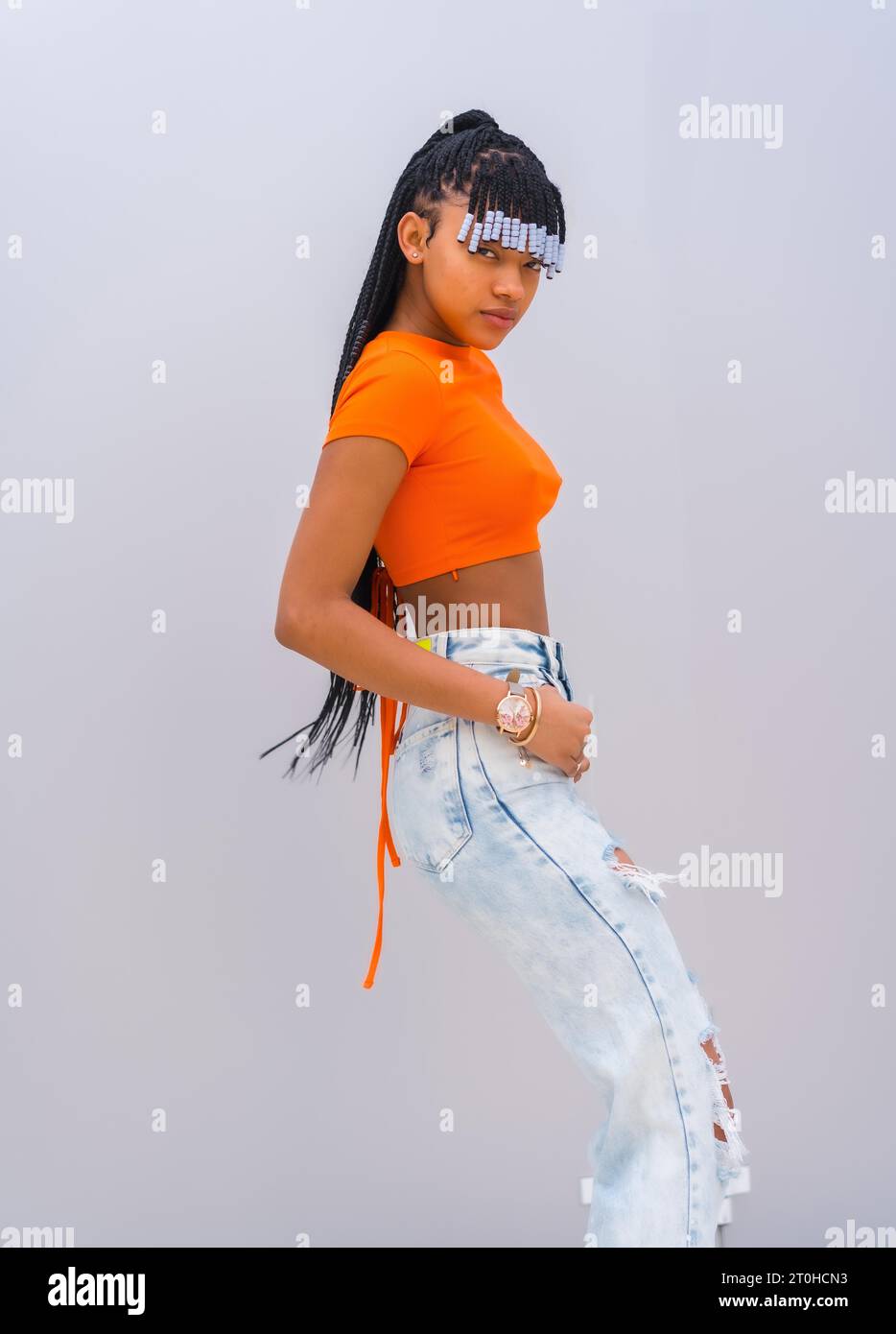 A young trap dancer with braids. Black Breed Girl of African Ethnicity ...