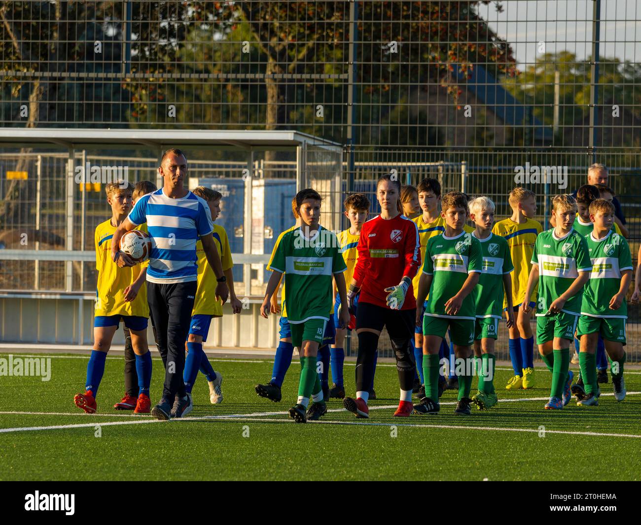 Football pitch, march-in children's and youth team, artificial turf ...