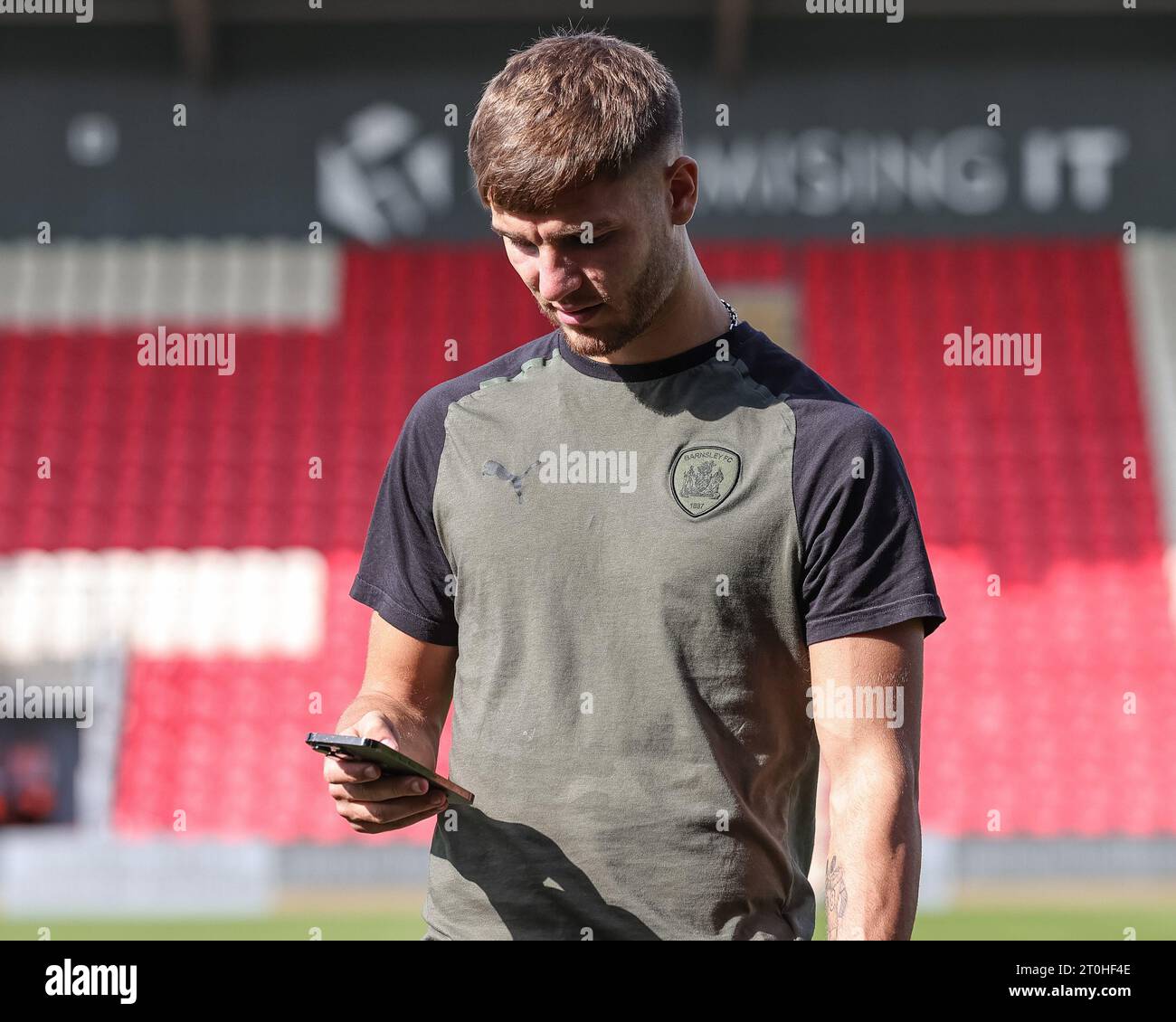 John Mcatee #45 of Barnsley arrives during the Sky Bet League 1 match ...