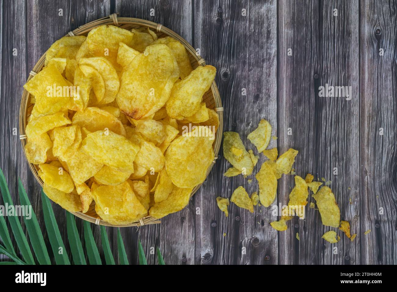 Rustic Delight: Golden Potato Chips in a Wooden Bowl - Tempting and ...