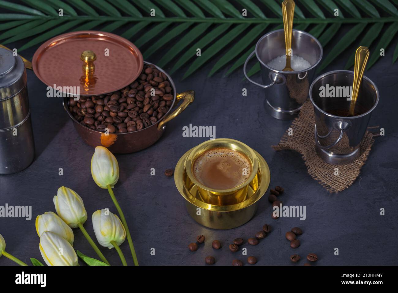 South Indian Filter coffee served in a traditional brass tumbler or cup ...