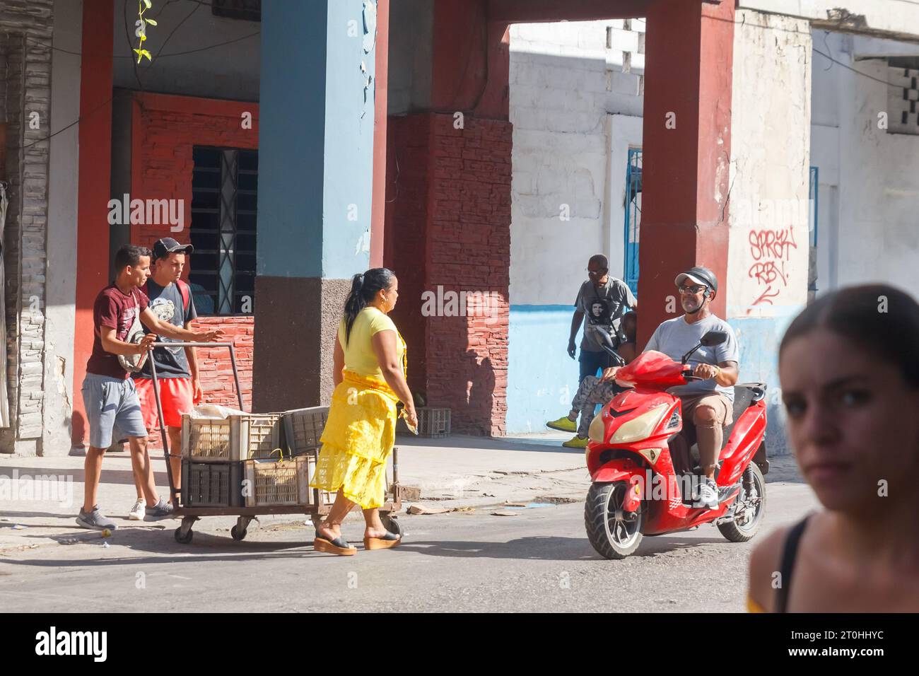 Lifestyle of real Cuban people in their daily life. Street scene where ...