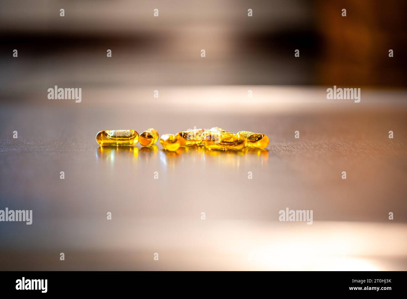 Multiple capsules with coenzyme Q10 coq10 on a kitchen counter Stock ...