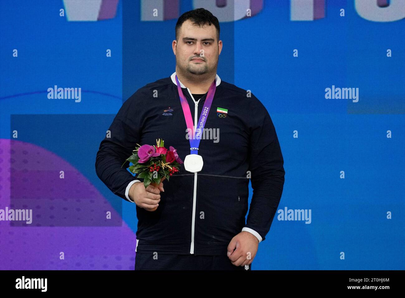 Silver medalist Al Davoudi of Iran pose during medal ceremonies at the ...