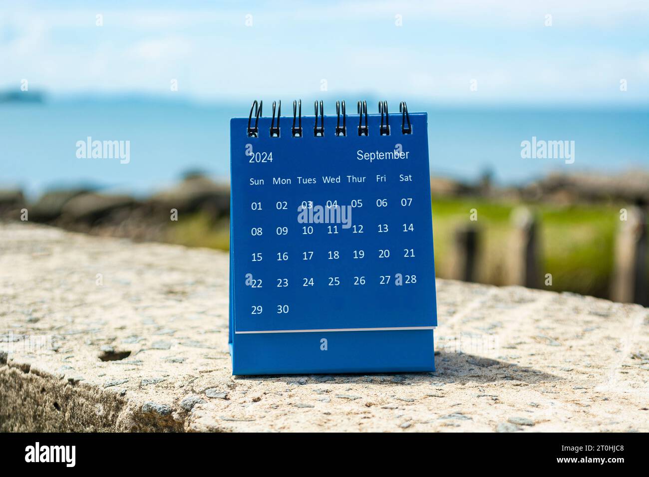 Blue September 2024 calendar on blurred background of blue ocean Stock ...