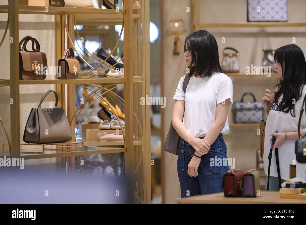Haikou, China's Hainan Province. 29th Sep, 2023. People shop at a duty-free shop in Haikou ...