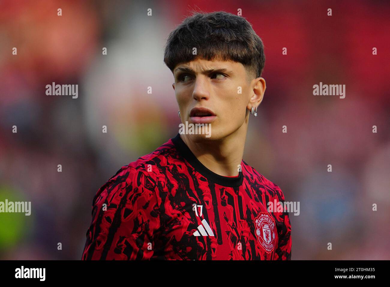 Manchester United's Alejandro Garnacho warms up before the English ...