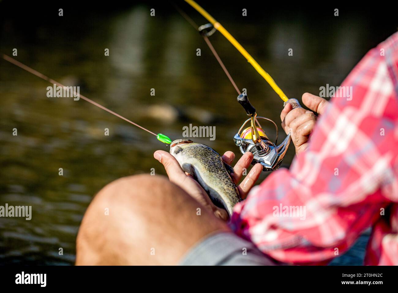 Fishing Reel. Fishing Rod with Aluminum Body Spool. Man hold big fish ...