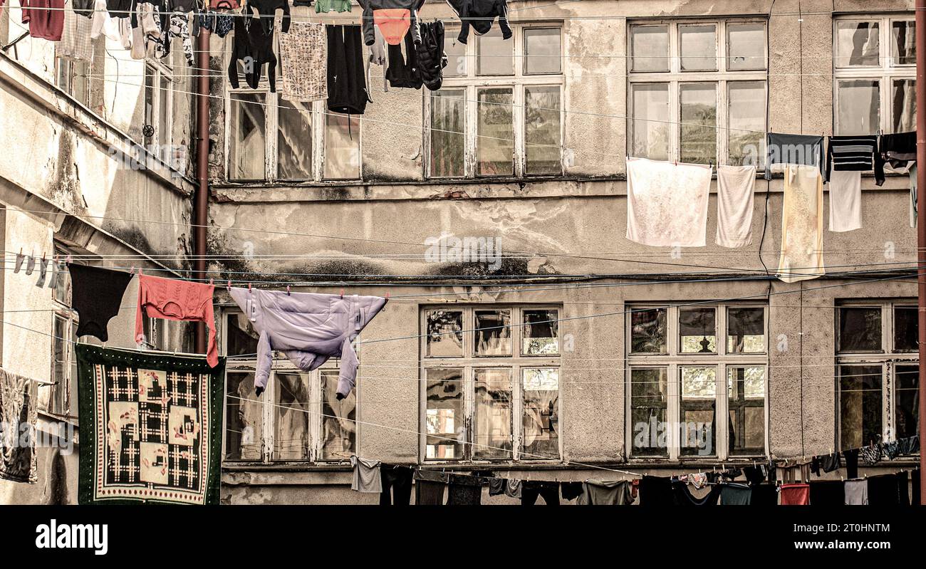 Poor district. Clothes hanging to dry on a clothes-line. Laundry ...