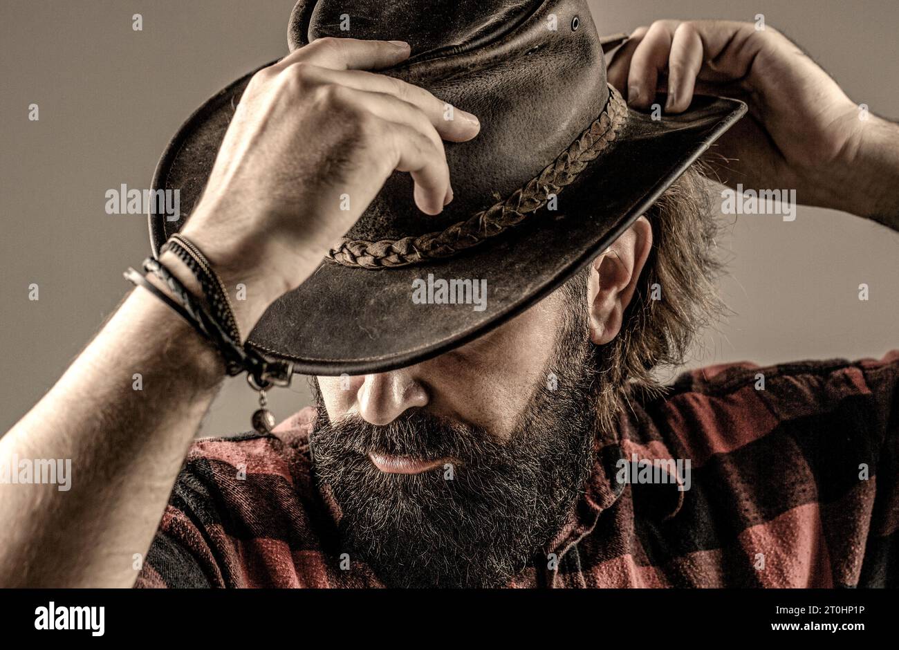 Man unshaven cowboys. American cowboy. Leather Cowboy Hat. Portrait of ...