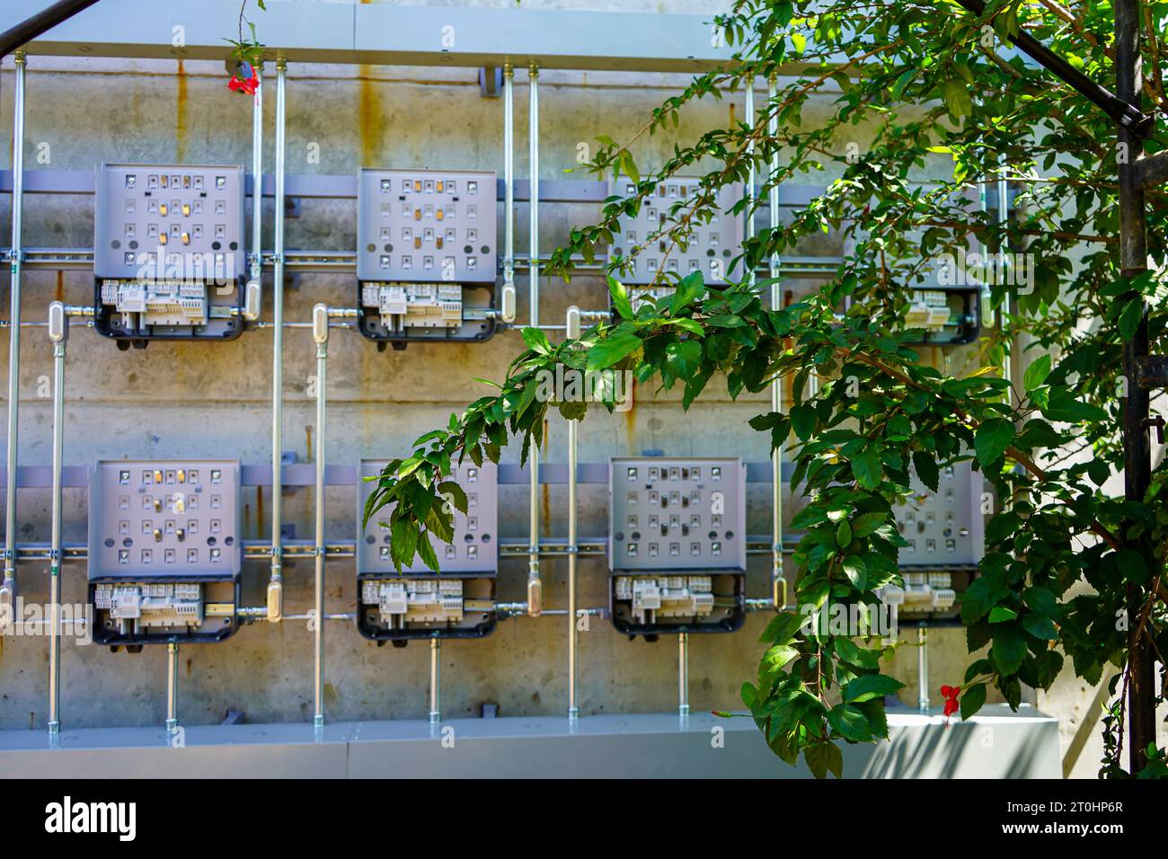 View of the installation of solar panels on a warehouse roof -green ...