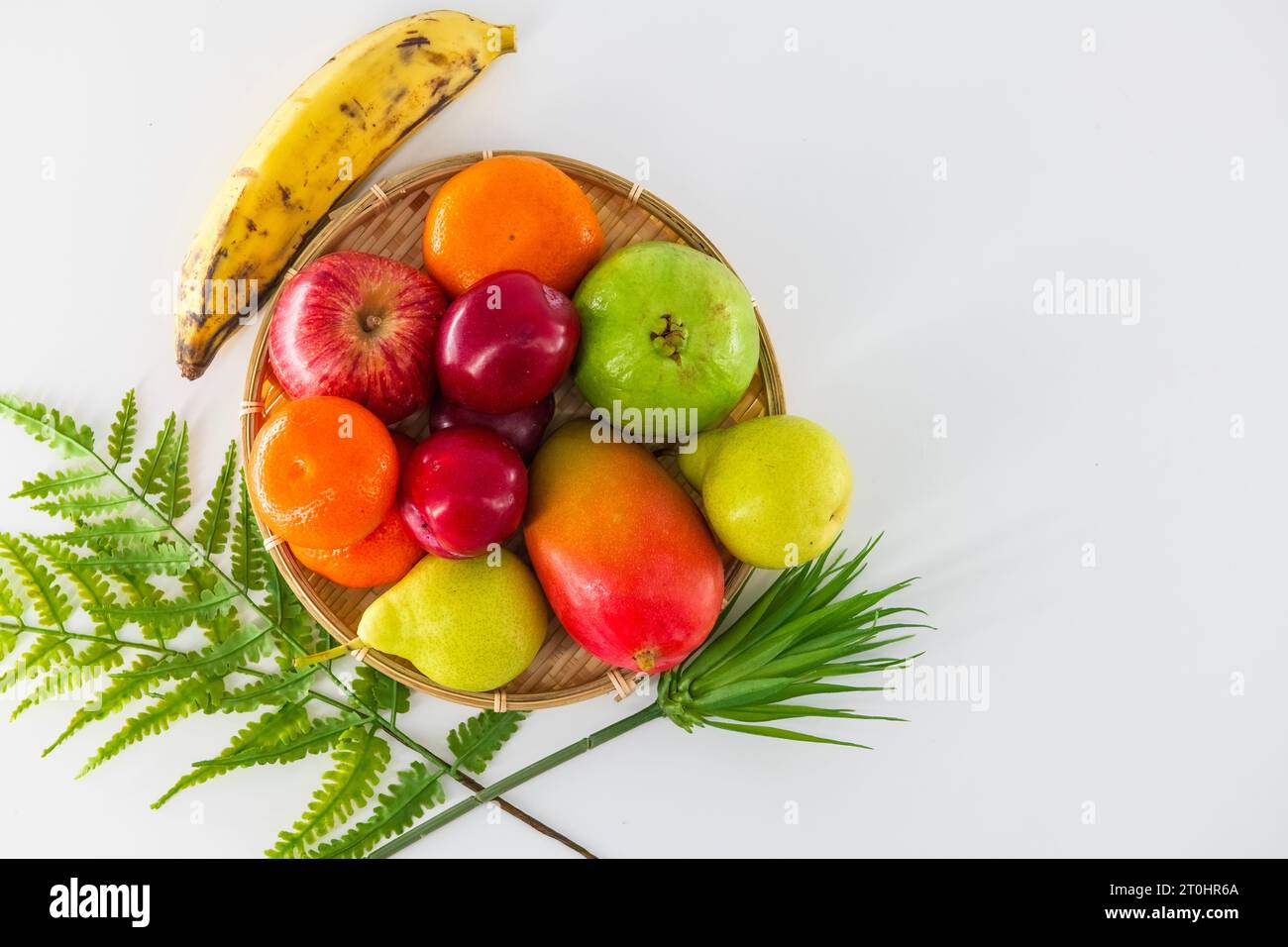 Healthy organic food background. Studio photo of different fruits and ...