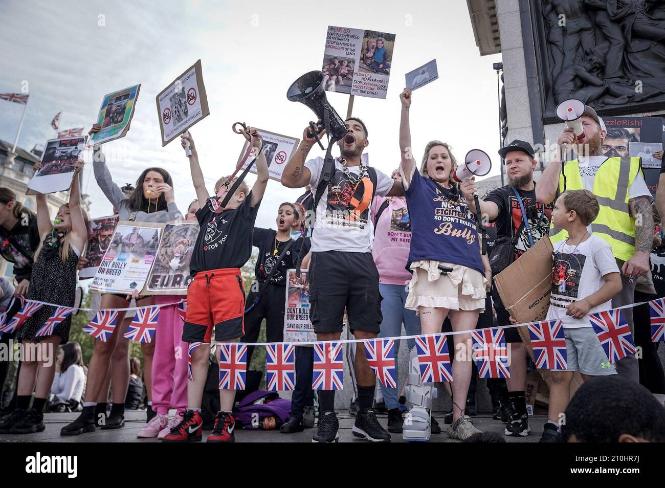 London, UK. 7th October 2023. American XL bully owners gather and march ...