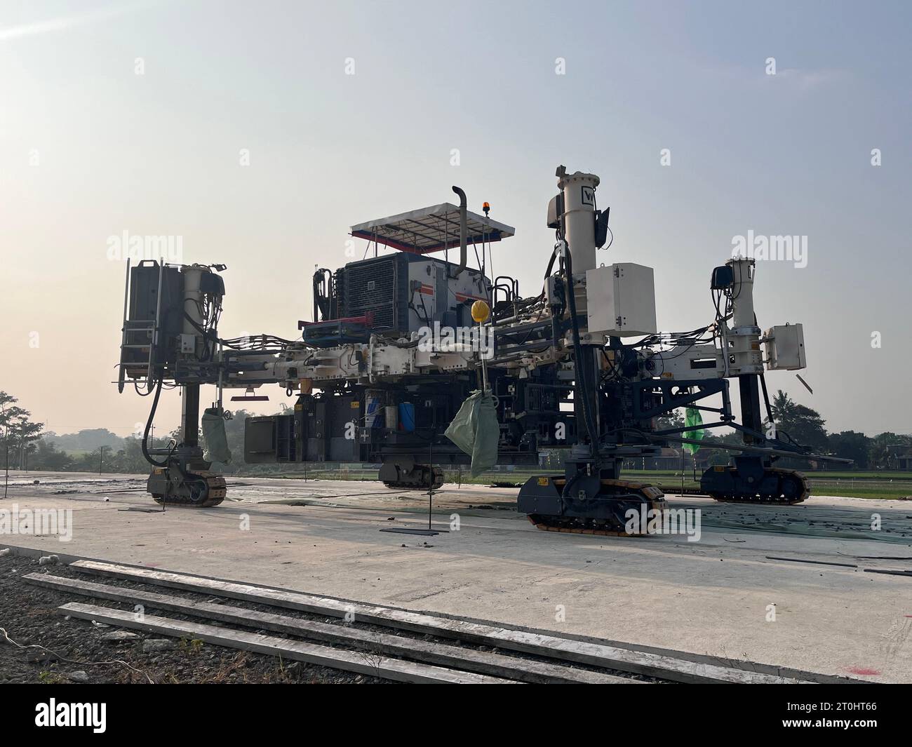 machine. Slipform paver machine on road work at construction site ...