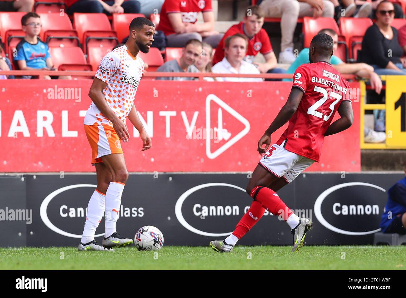 CJ Hamilton of Blackpool looks to get past Corey Blackett-Taylor of ...