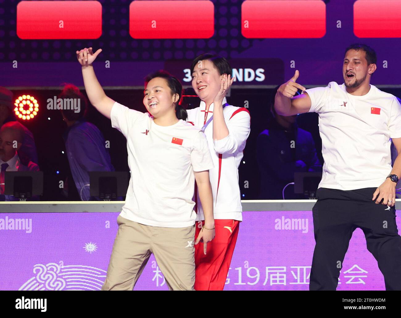 Hangzhou, China's Zhejiang Province. 7th Oct, 2023. Liu Qingyi of China (L) react after the ...