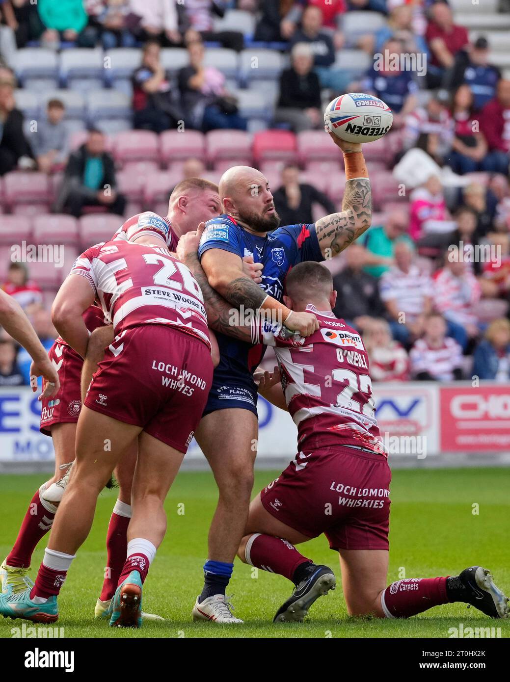 Wigan, UK. 07th Oct, 2023. Sam Luckley #26 of Hull KR offloads the ball ...