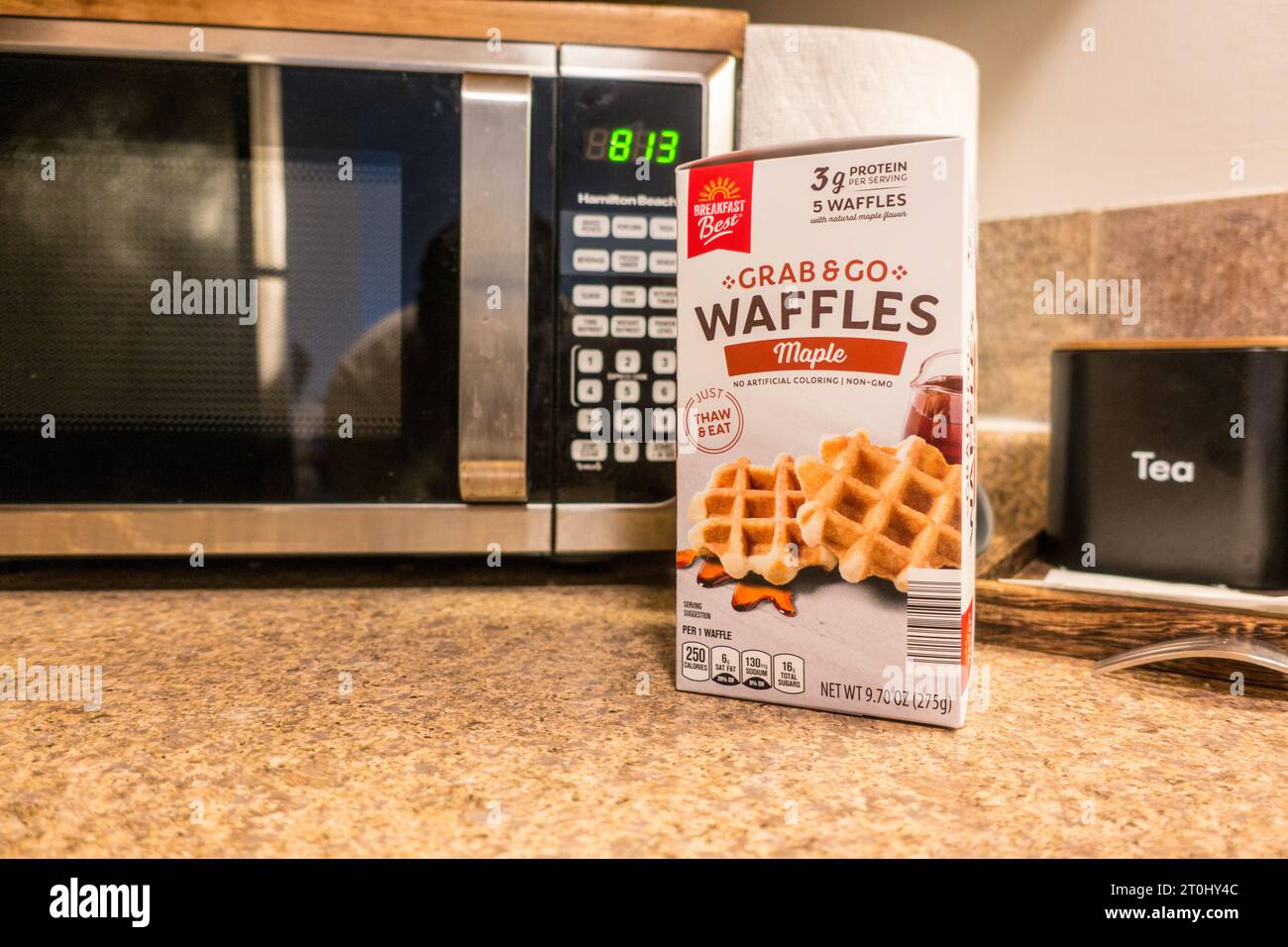 Readymeal breakfast concept. Waffles and microwave Stock Photo - Alamy