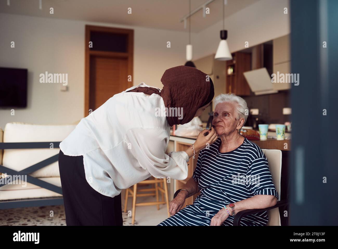 In this heartwarming real-life scene, a girl in a hijab and her sister ...