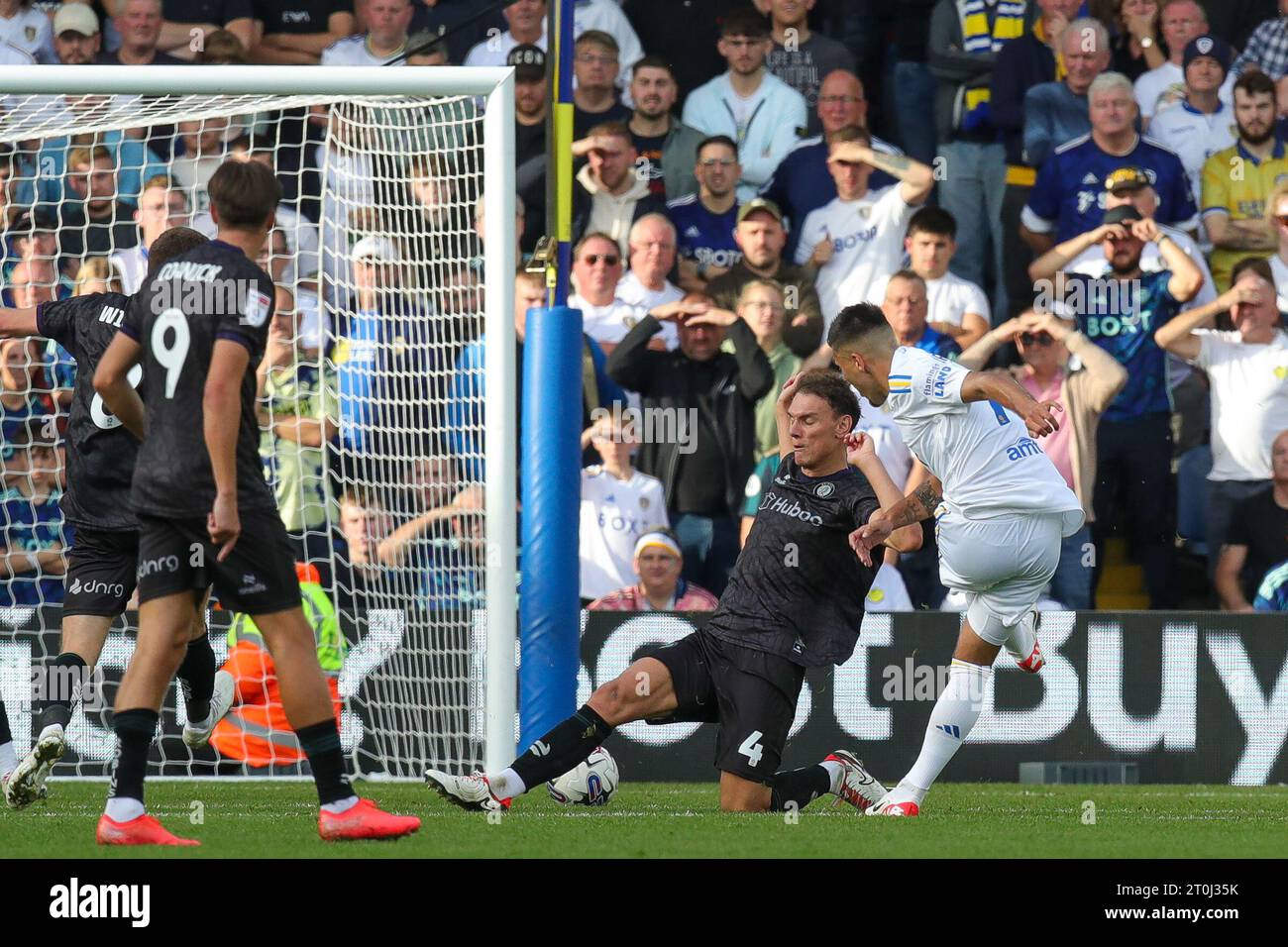 Joël Piroe #7 of Leeds United takes a shot and scores a goal to make it ...