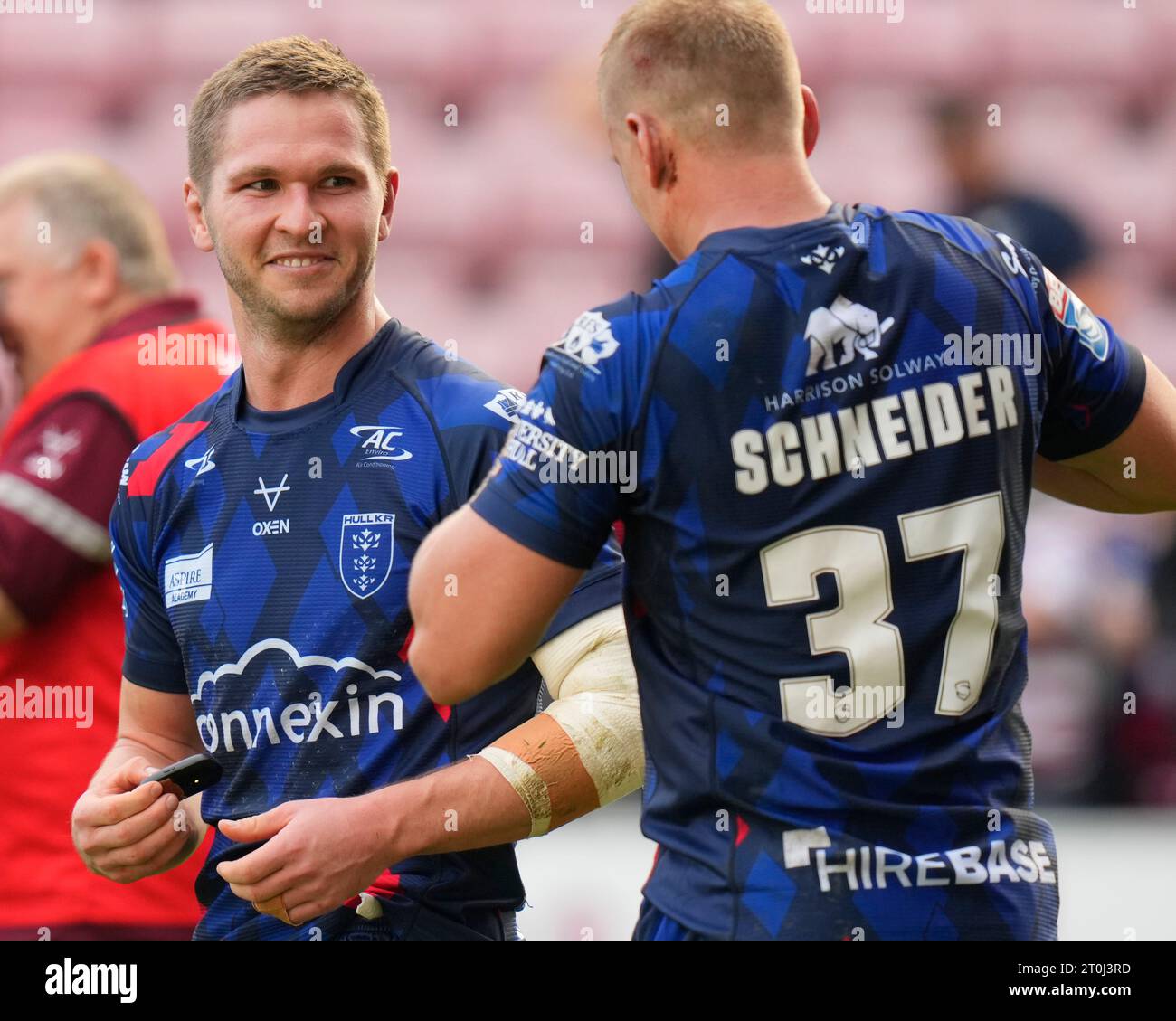 Matt Parcell #9 of Hull KR speaks with Brad Schneider #37 of Hull KR ...