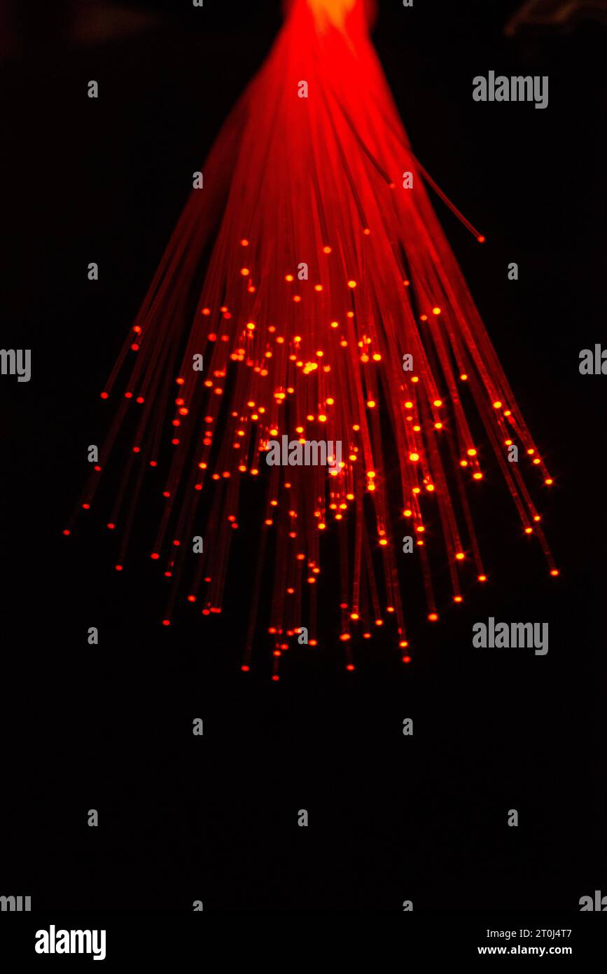 Red light through optic cable Stock Photo - Alamy