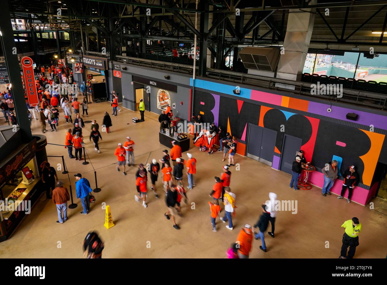 Fans walk through the concourse before Game 1 of an American League ...