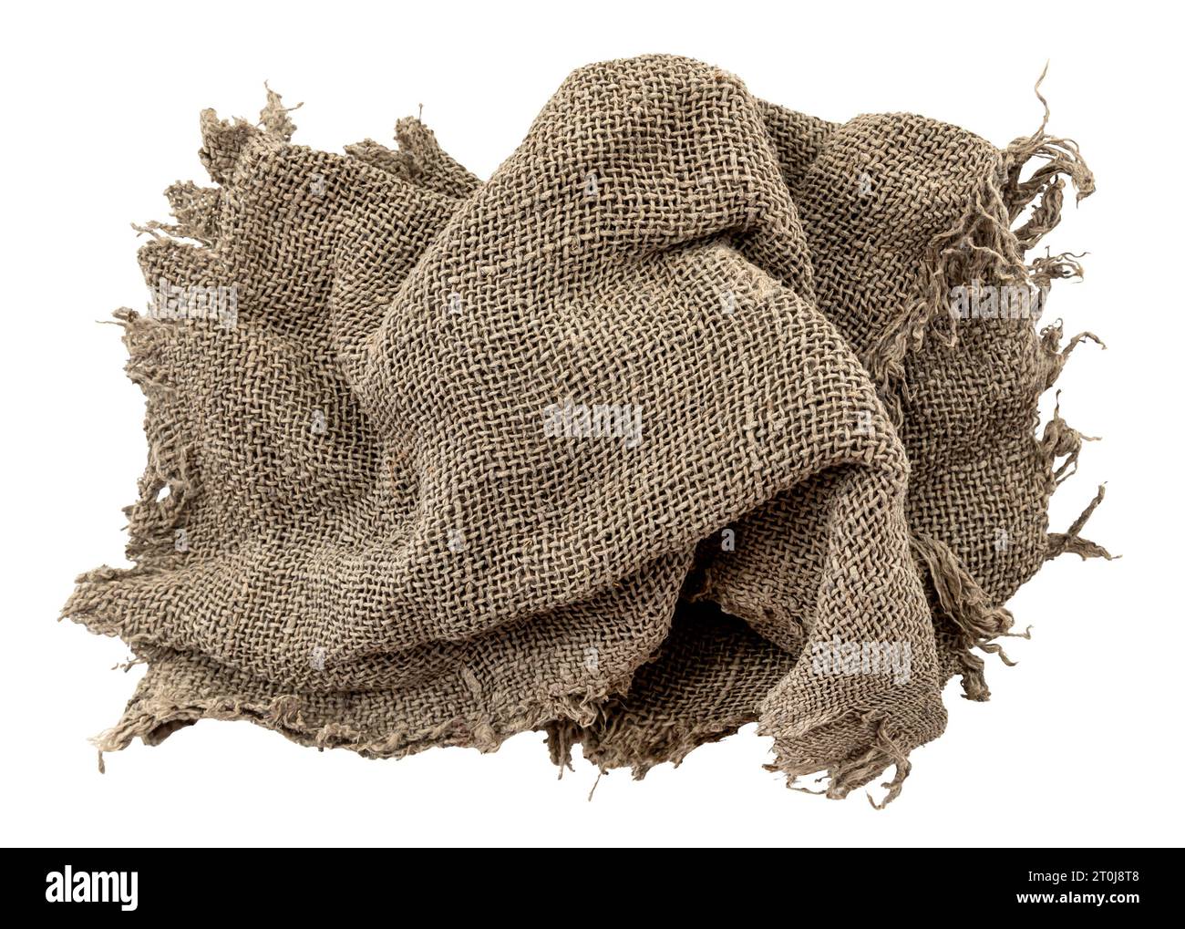 A crumpled piece of burlap with folds on a white background. Burlap ...