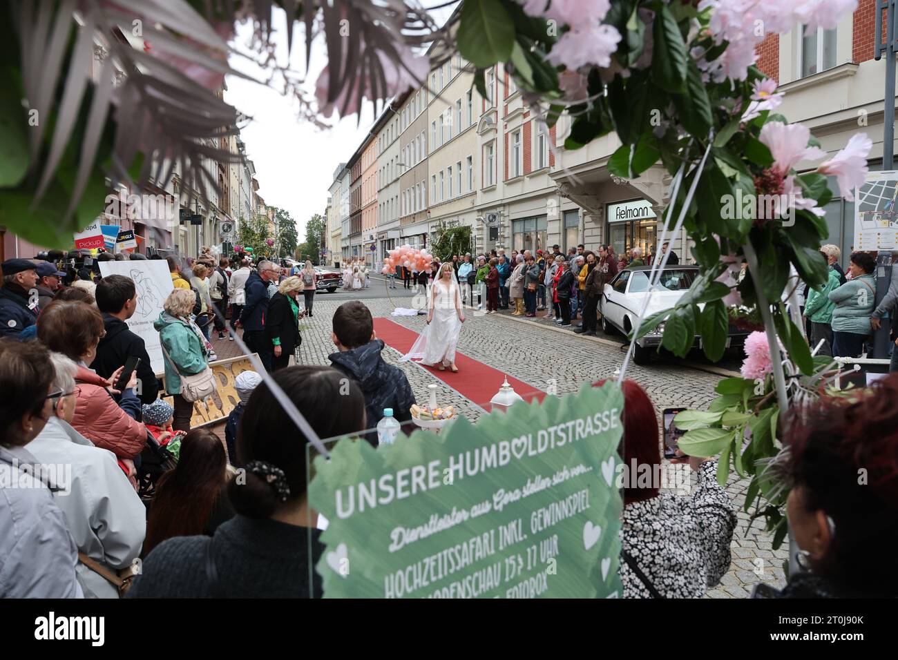 Gera, Germany. 07th Oct, 2023. A model walks down a red carpet at a ...