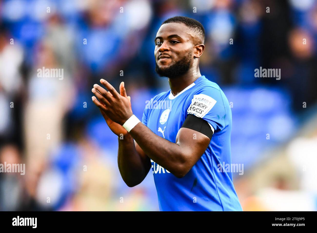 David Ajiboye (16 Peterborough United) applauds fans during the Sky Bet ...