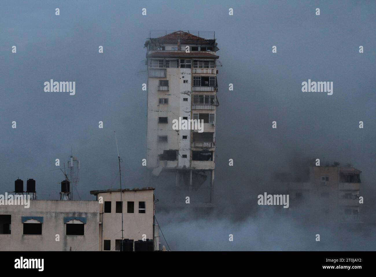 Smoke and flames billow after Israeli forces struck a high-rise tower ...