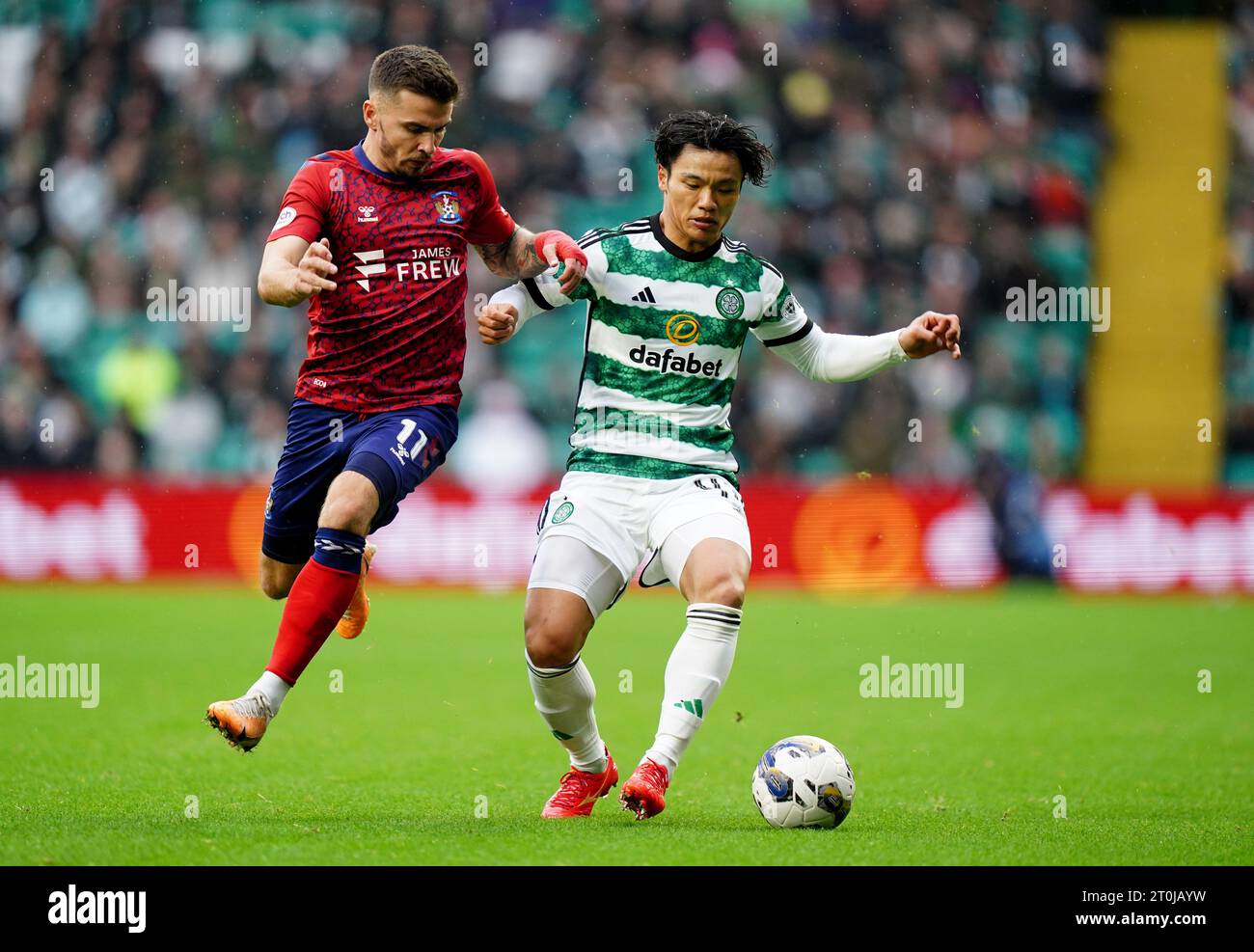 Celtic’s Reo Hatate and Kilmarnock’s Daniel Armstrong battle for the ...
