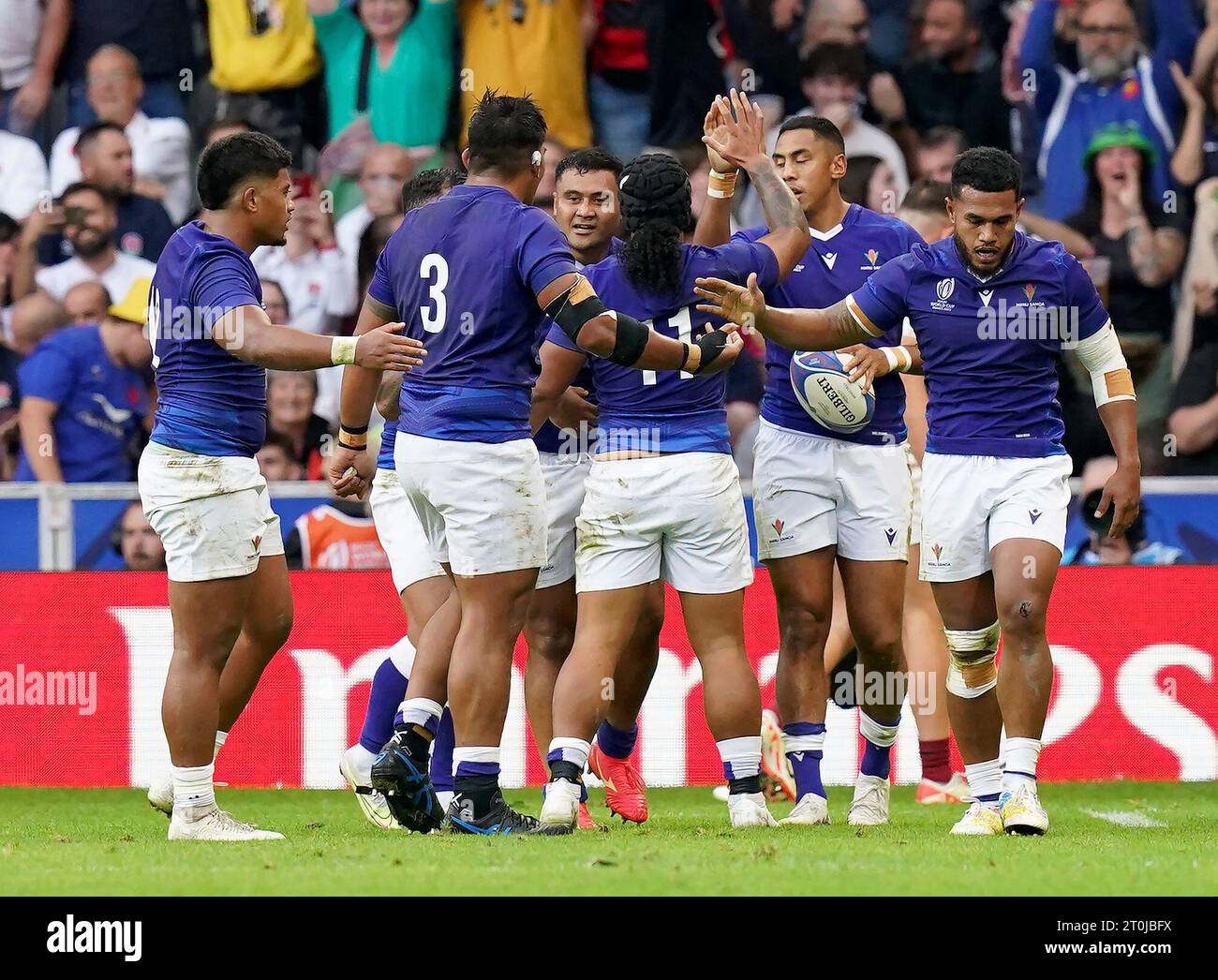 Samoa celebrate after Nigel Ah-Wong (second right) scores their first ...