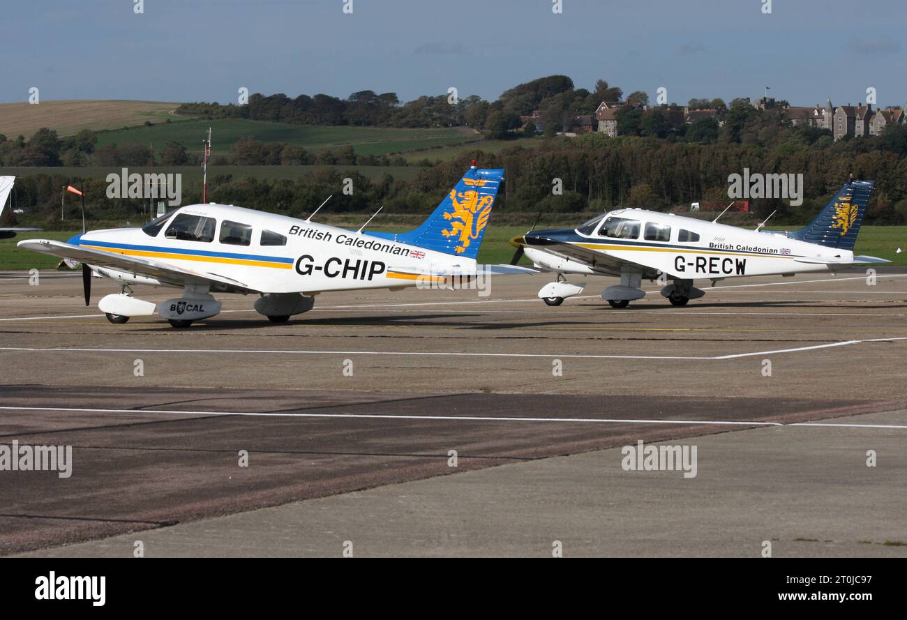 A pair of PIper Pa-28 Cherokees in varying era British Caledonian ...