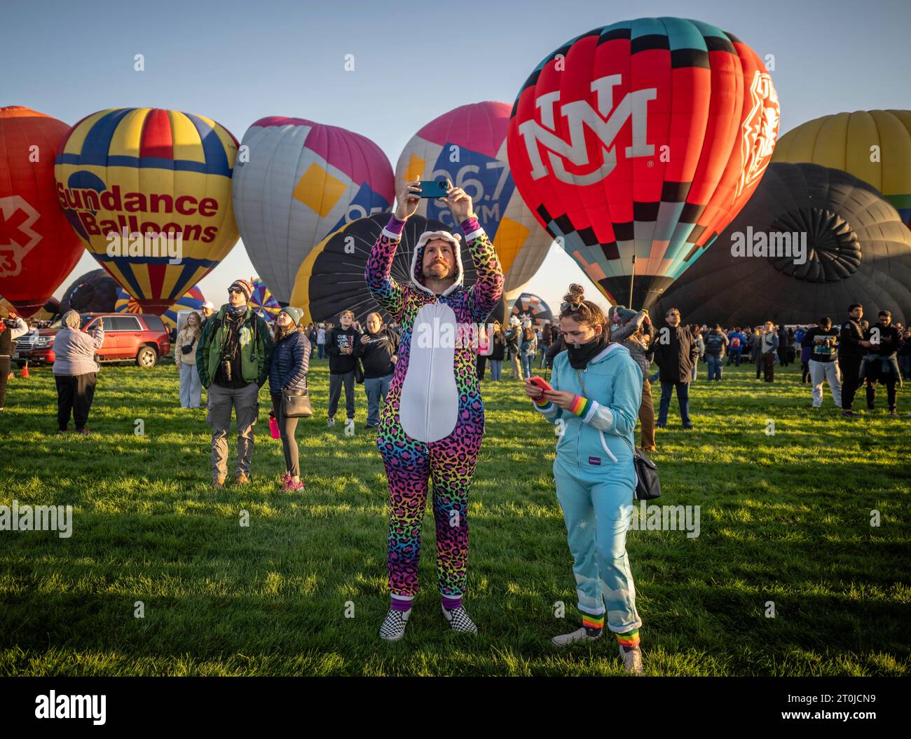 Walter Myal, left and his girlfriend Chelsea Peterson witness the start ...