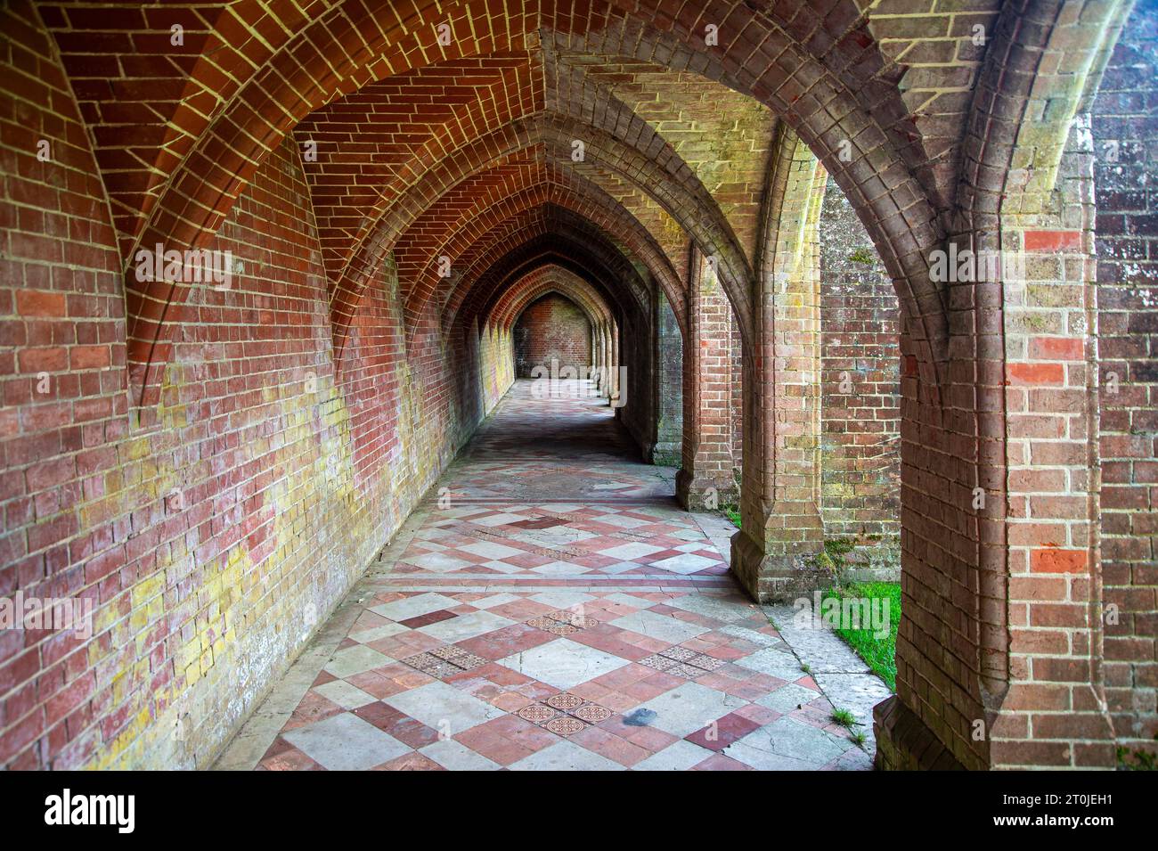 brick arches with tiled floor Stock Photo - Alamy