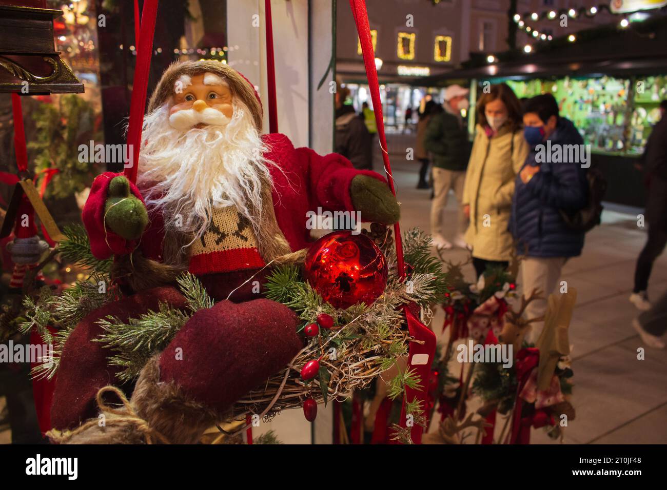 Santa Claus doll on Christmas market. Santa with gifts and unknown ...