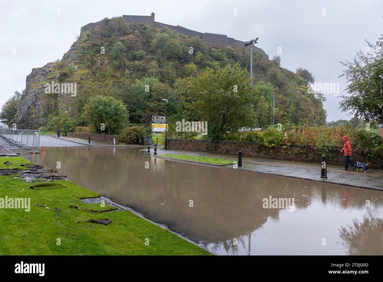 Floodwater covers the road outside Dumbarton Football Club in Dumbarton ...